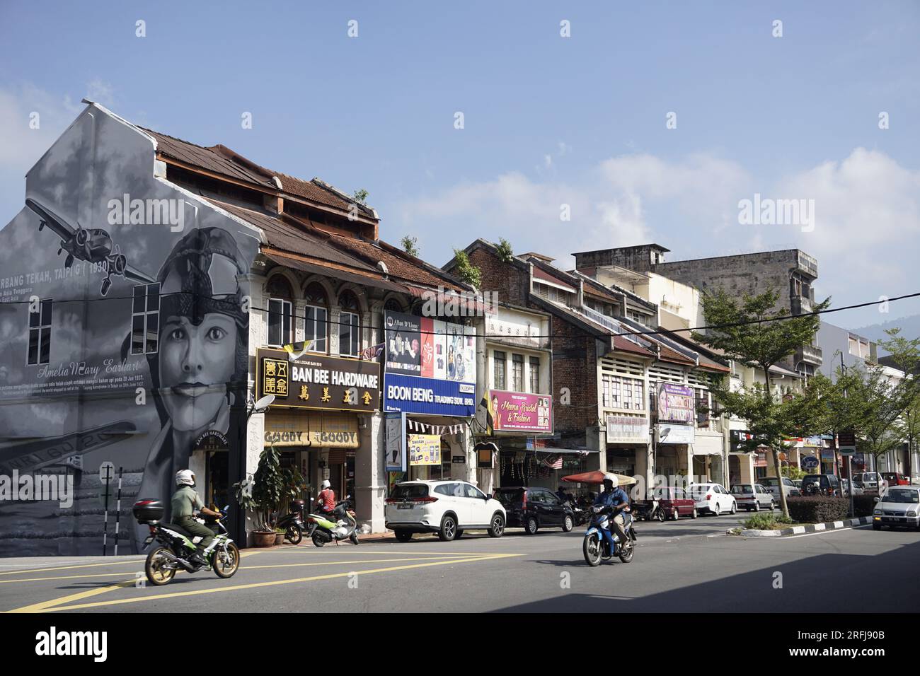 street in Taiping, Malaysia, with Amelia Earhart mural painted on the ...