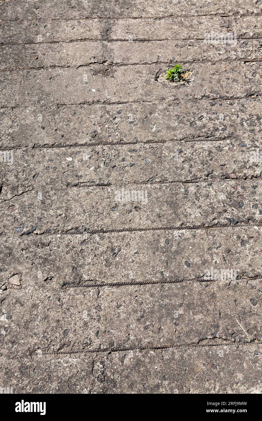 old collapsing reinforced concrete slabs laid for pedestrian and ...