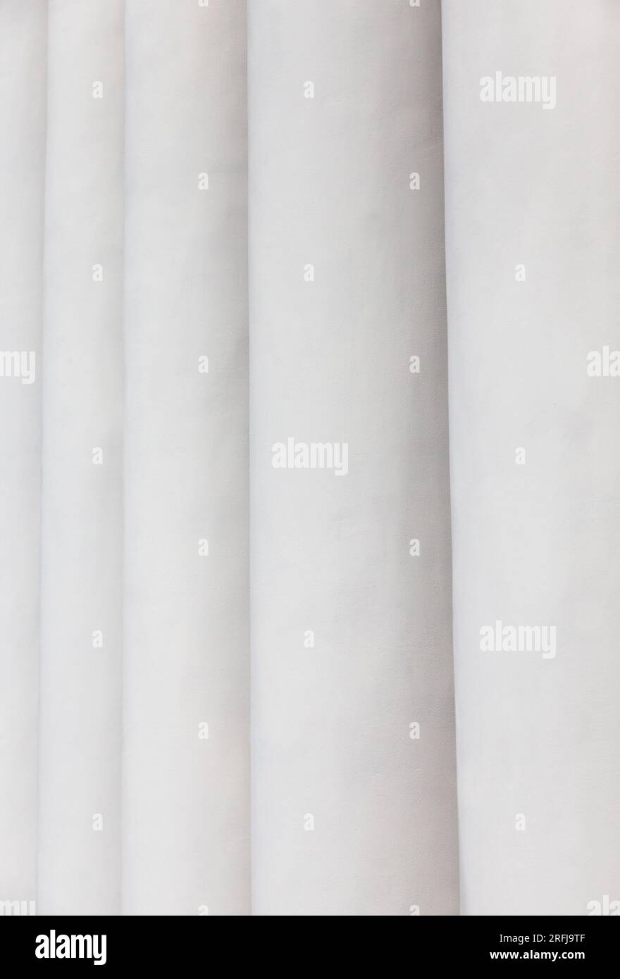 the columns of the building painted in white paint, the columns of ...