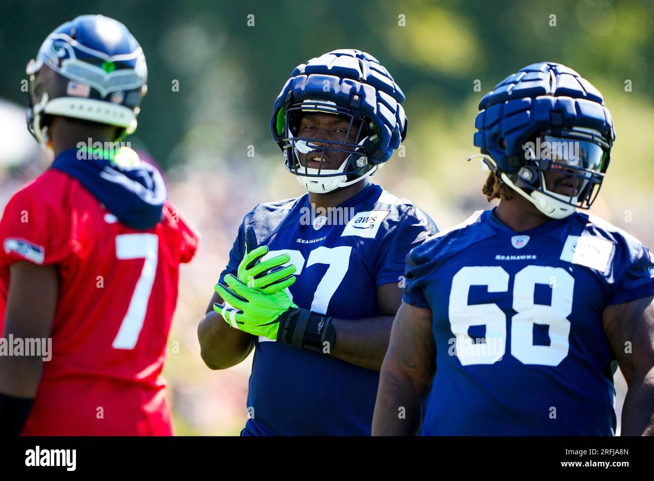 Seattle Seahawks quarterback Geno Smith (7), offensive tackle Charles ...