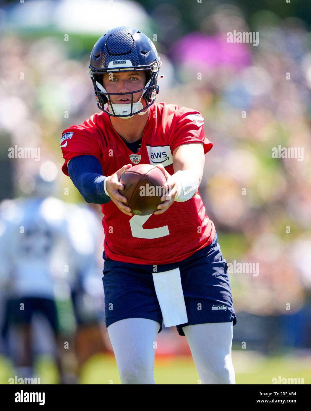 Seattle Seahawks quarterback Drew Lock (2) holds out the football ...