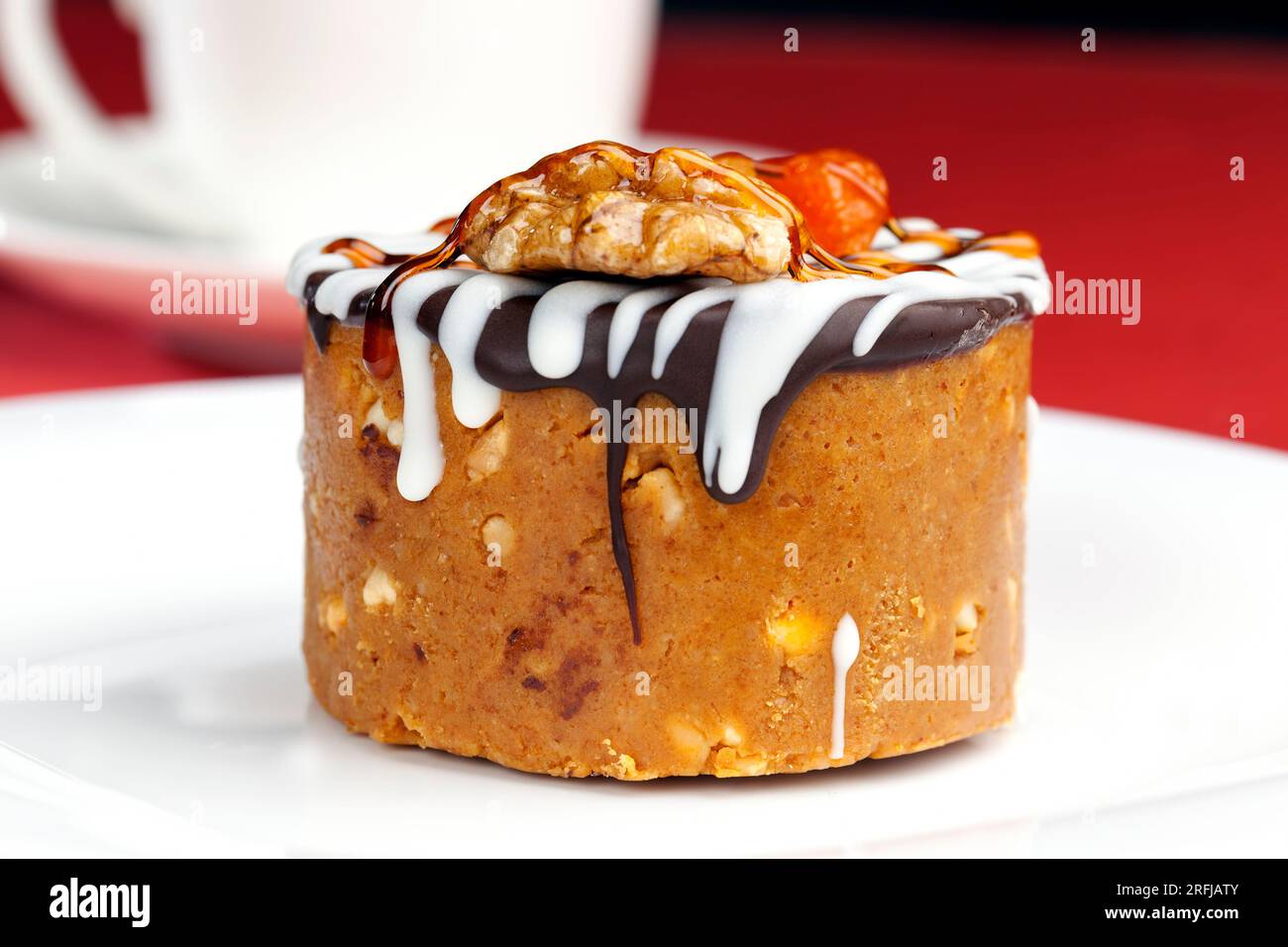 sweet cake in the shape of a cylinder, made of peanuts, sugar and dairy ...
