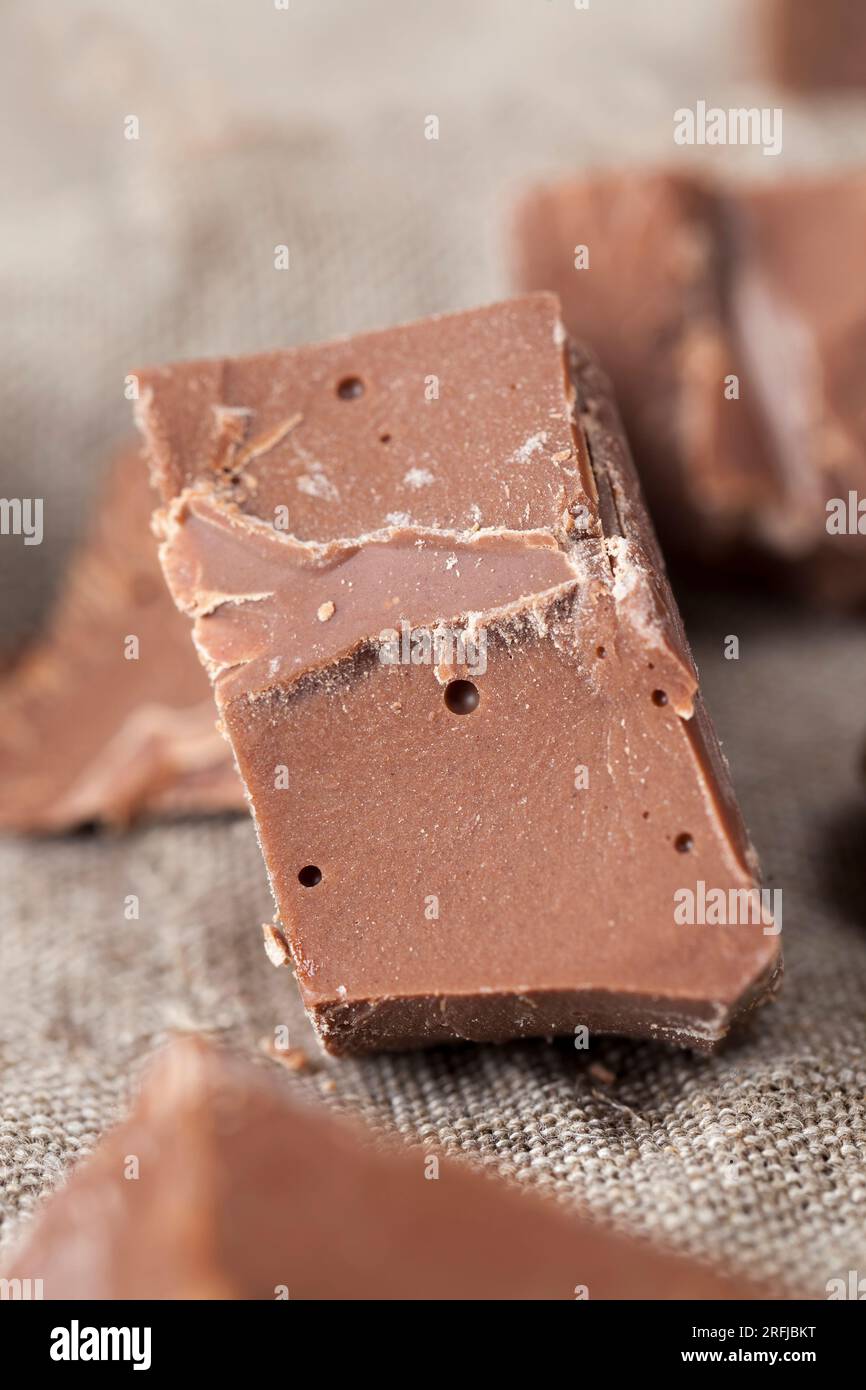 broken into pieces and crumbs milk chocolate, chocolate from cocoa ...