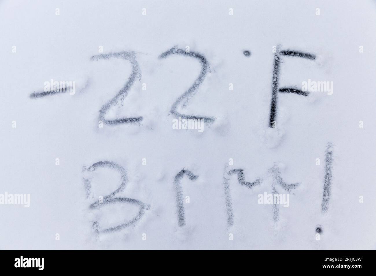 drawn on the snow, temperature symbols denoting negative very cold ...