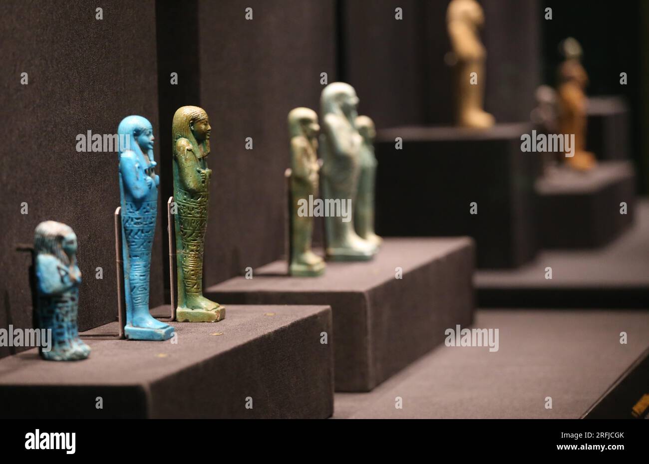 People visit the exhibition featuring mummies and rare relics of ...