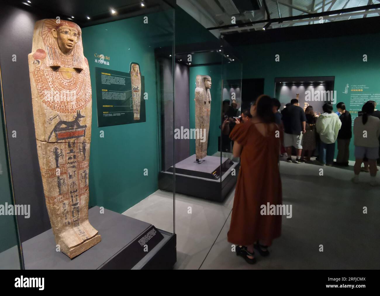 People visit the exhibition featuring mummies and rare relics of ...