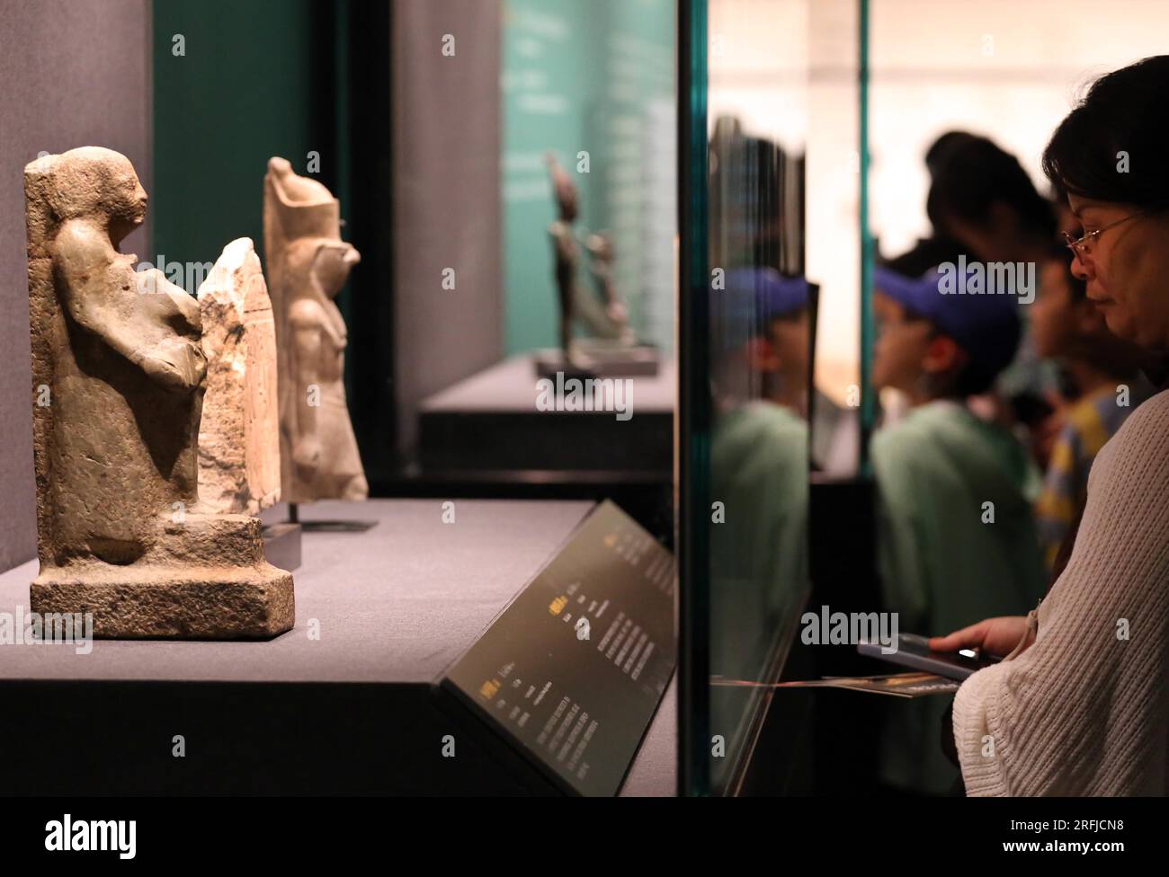 People visit the exhibition featuring mummies and rare relics of ...