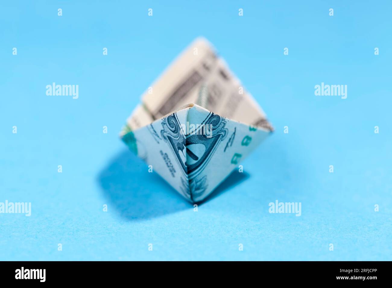 paper boat made of one american dollar, made of cash dollars paper boat ...