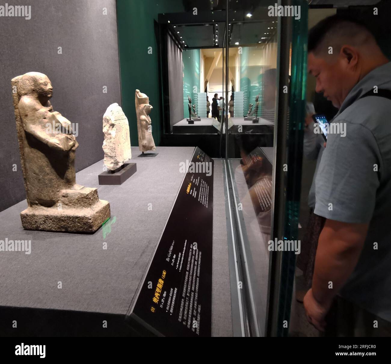 People visit the exhibition featuring mummies and rare relics of ...