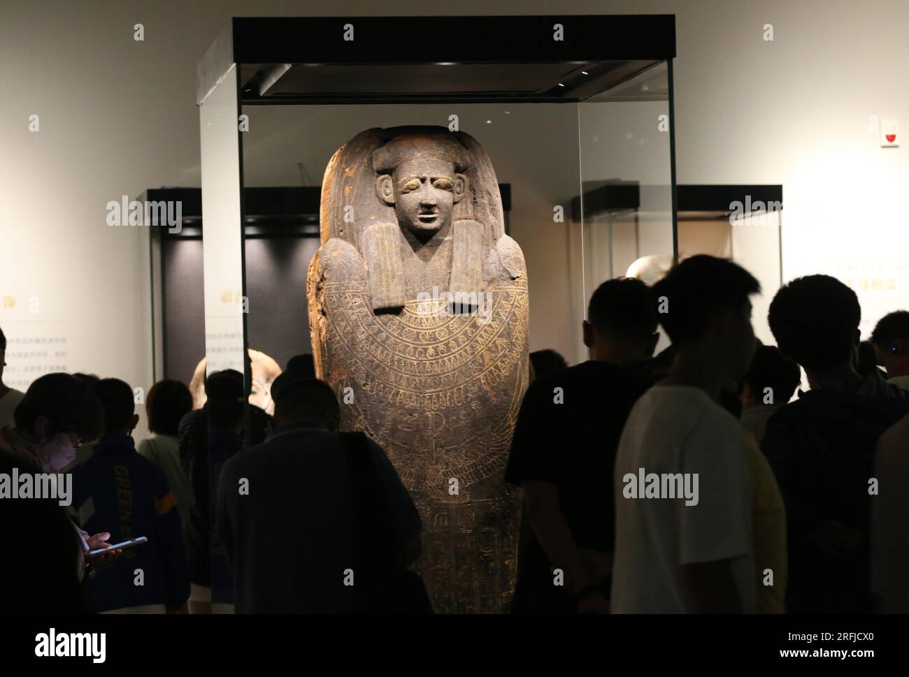 People visit the exhibition featuring mummies and rare relics of ...