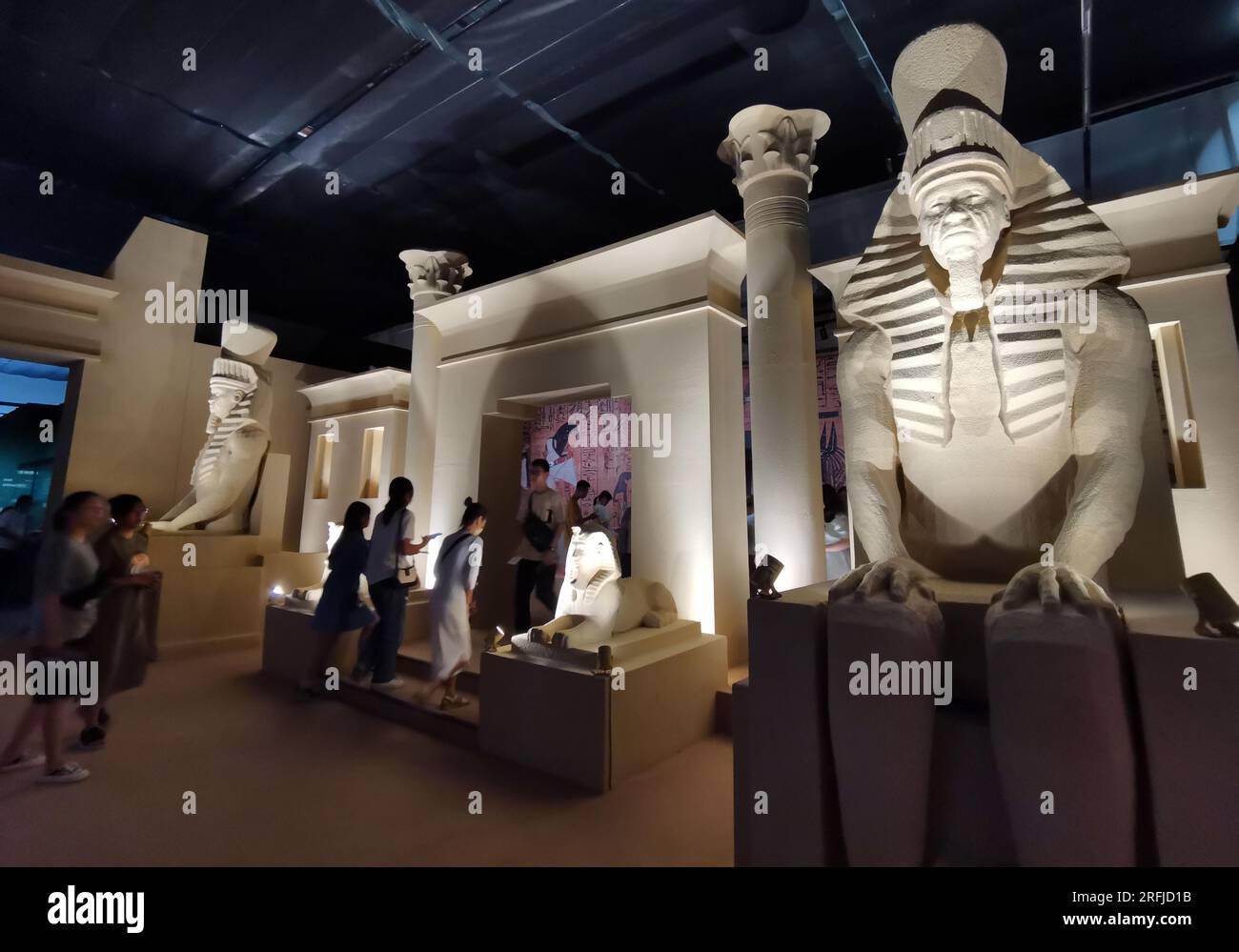 People visit the exhibition featuring mummies and rare relics of ...
