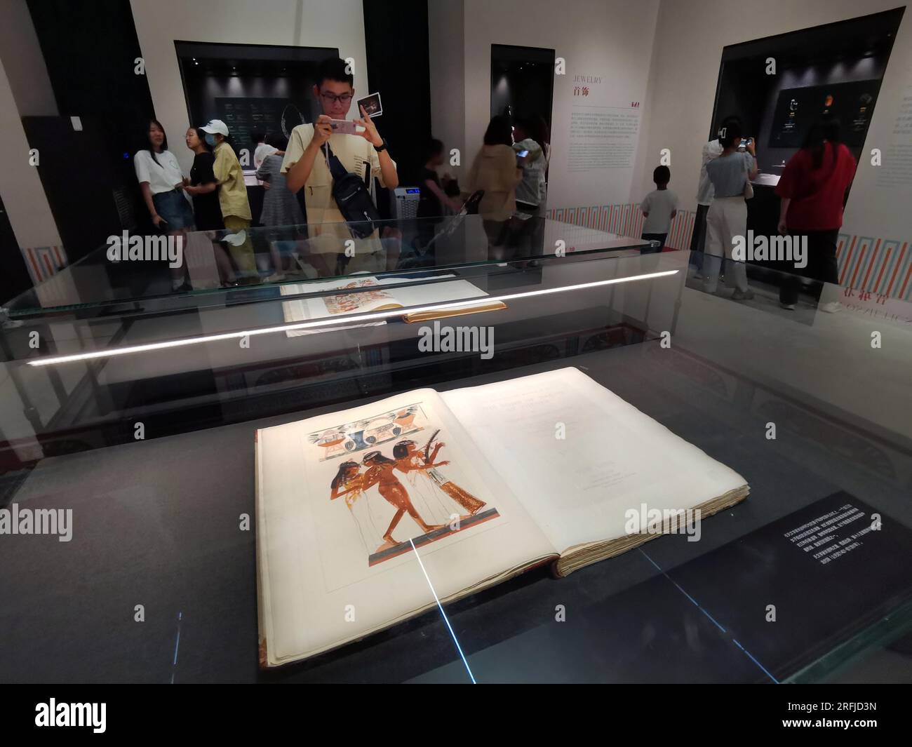 People visit the exhibition featuring mummies and rare relics of ...