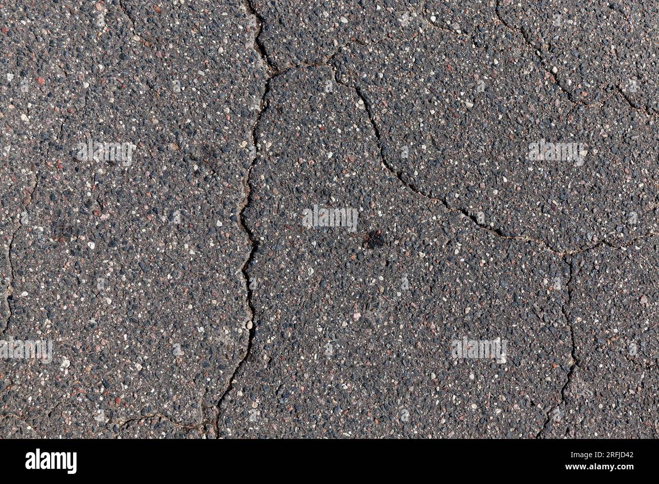 repair of a broken and damaged paved road, the road has many defects ...