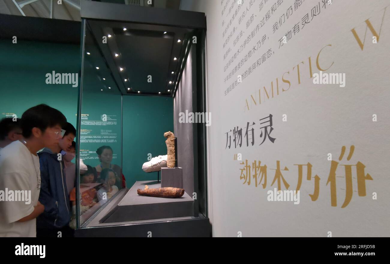 People visit the exhibition featuring mummies and rare relics of ...