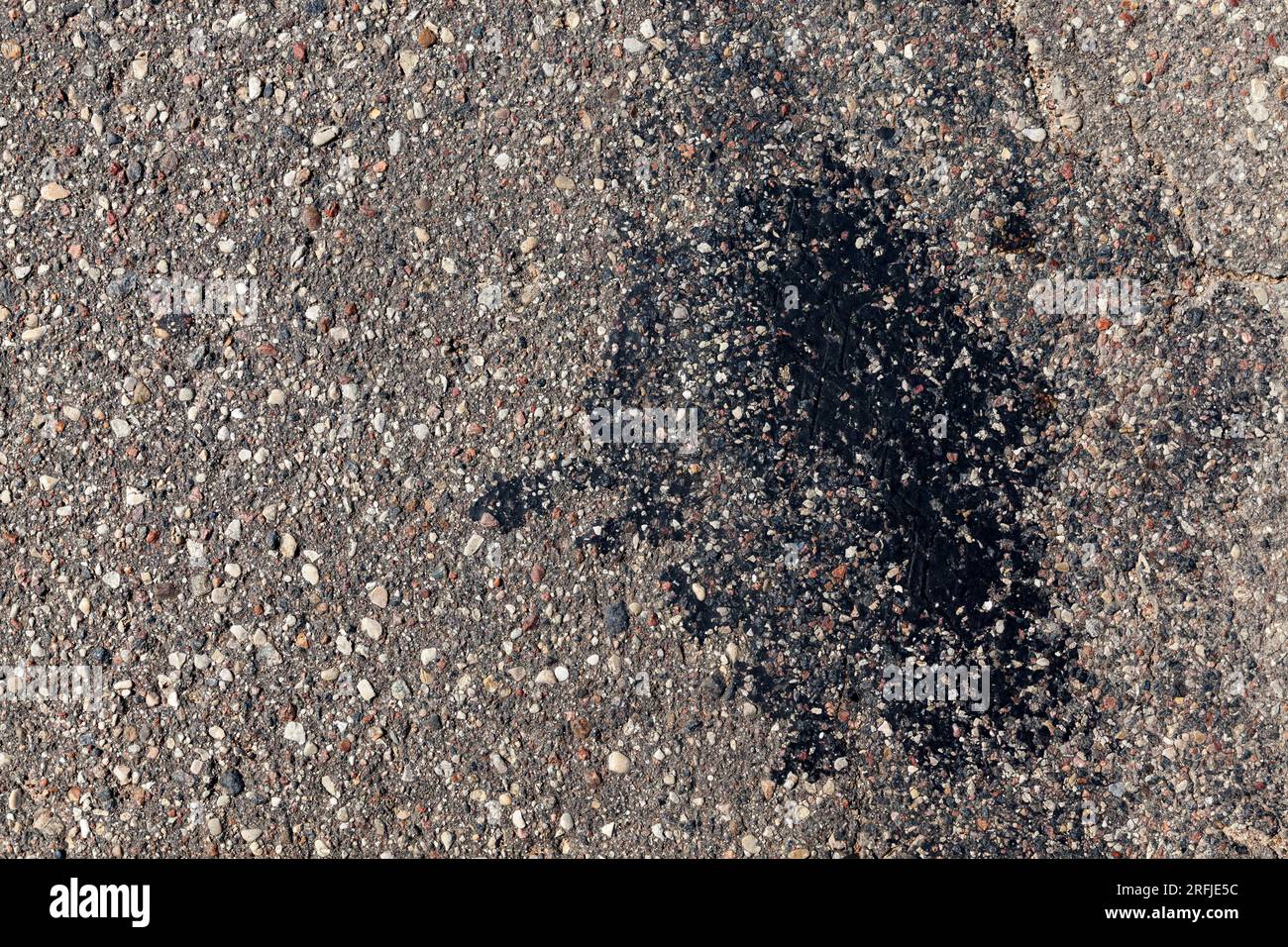 repair of a broken and damaged paved road, the road has many defects ...