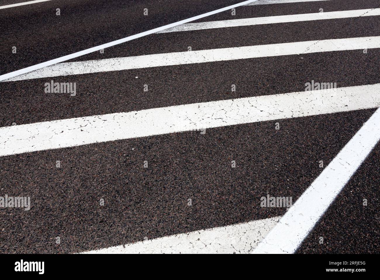 paved road with white road markings, painted with white paint ...