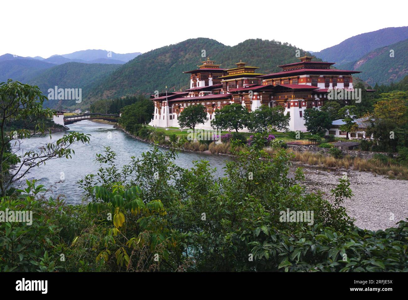 Bhutan's historic Punakha Dzong seen from across the Mo Chhu River with ...
