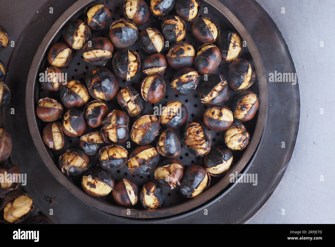 traditional Istanbul street food grilled chestnuts in a row Stock Photo ...