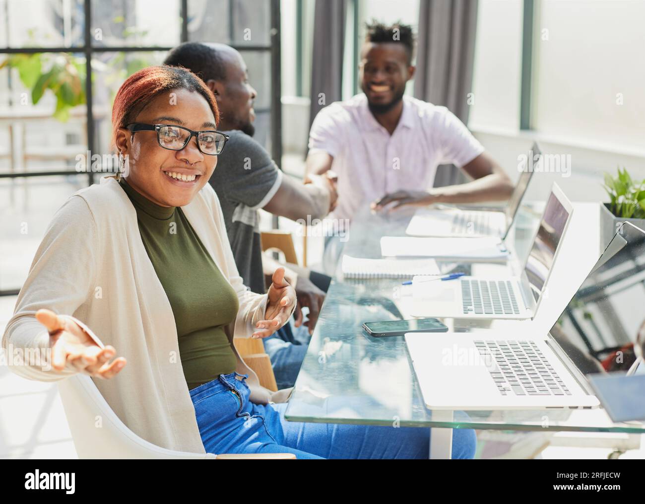 Office with employees working on computers Stock Photo - Alamy