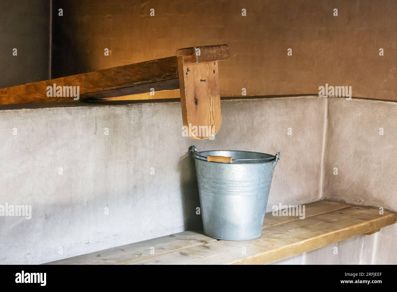 Tin buckets in the sauna steam room of Amuri Museum of historic housing ...
