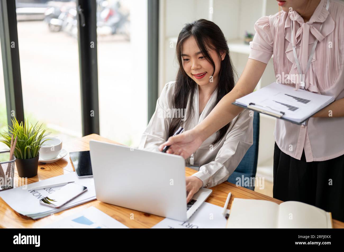 Female accountant discussing on hi-res stock photography and images - Alamy