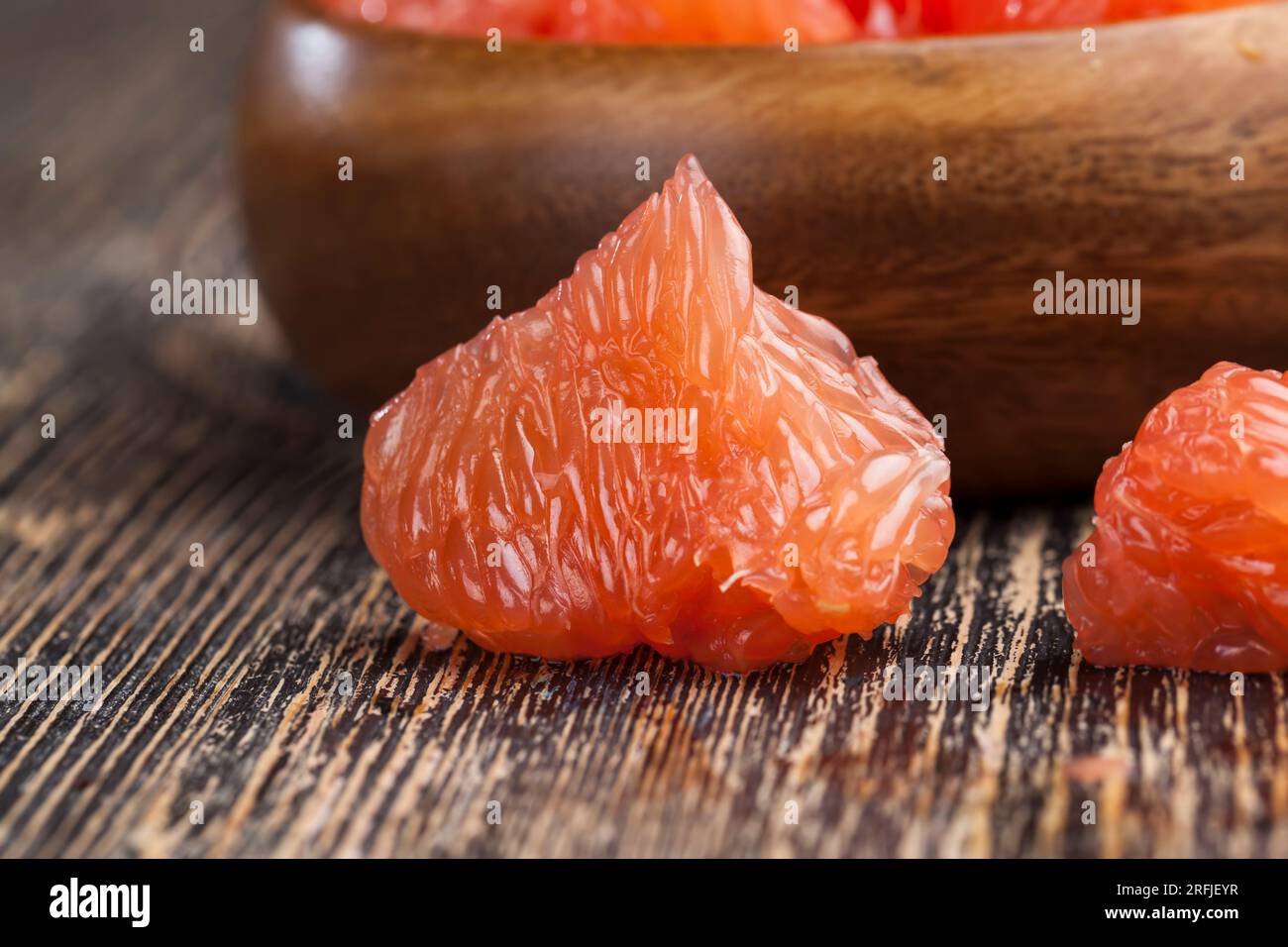 sour ripe grapefruit peeled and divided into slices, pink grapefruit ...