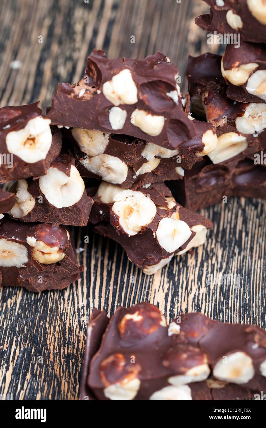 homemade bitter chocolate bar with roasted hazelnuts, bitter chocolate ...