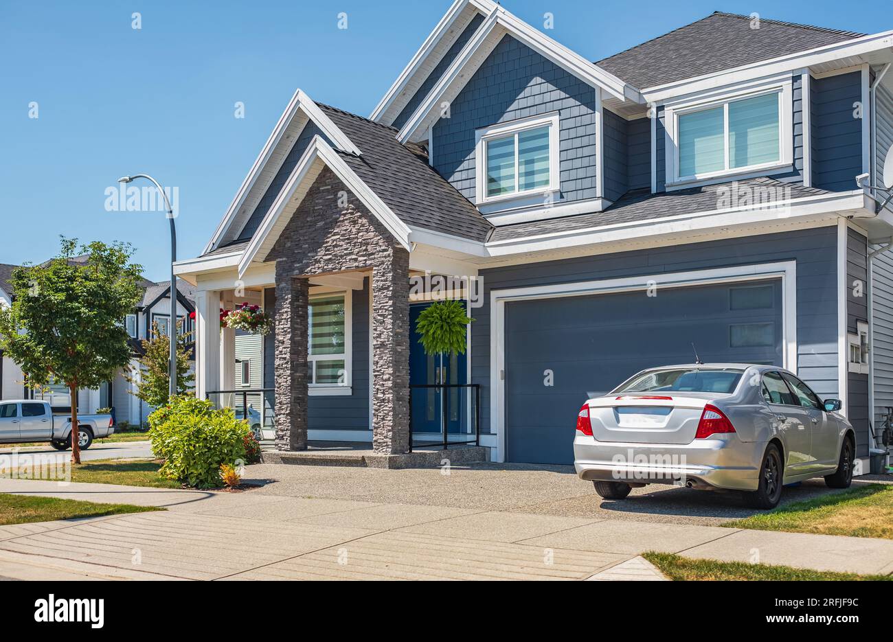 Real Estate Exterior Front House. Big modern custom house front yard ...