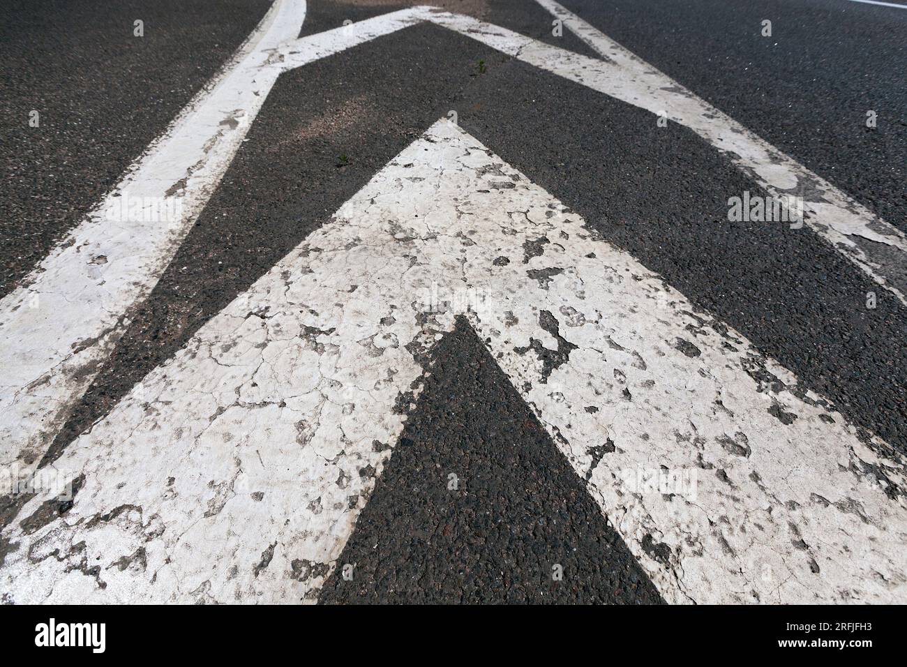paved road with white road markings, painted with white paint ...