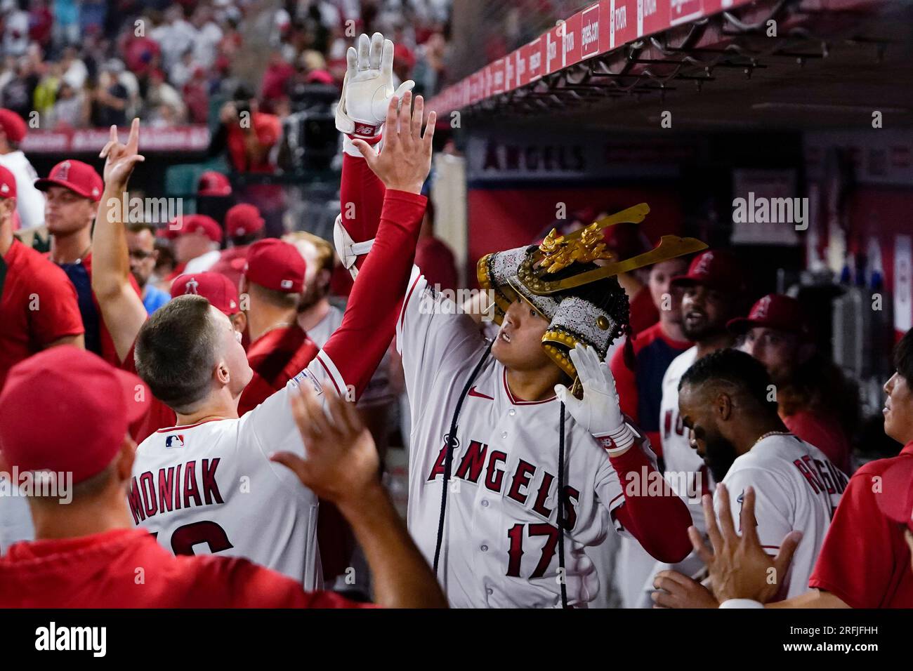 Los Angeles Angels' Shohei Ohtani (17) celebrates in the dugout while ...