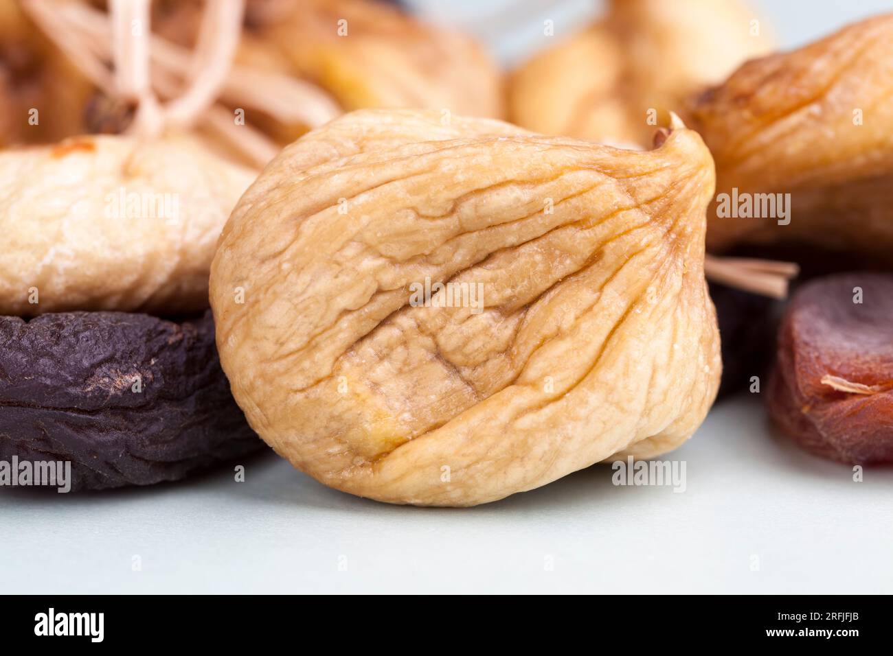 yellow shriveled figs dried to give sweetness, traditional oriental ...