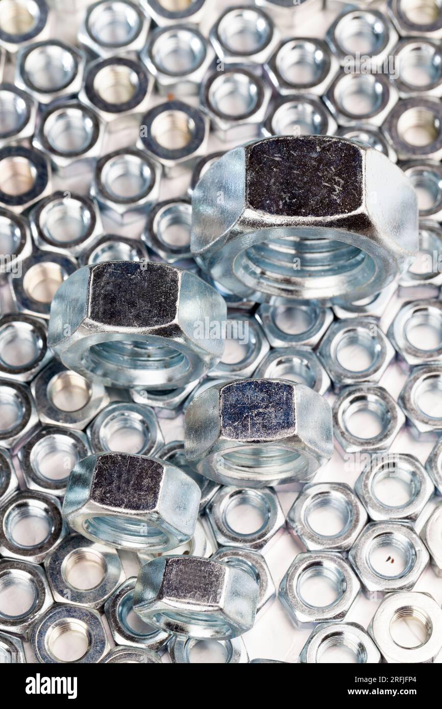 iron nuts for use in installation and construction work Stock Photo - Alamy