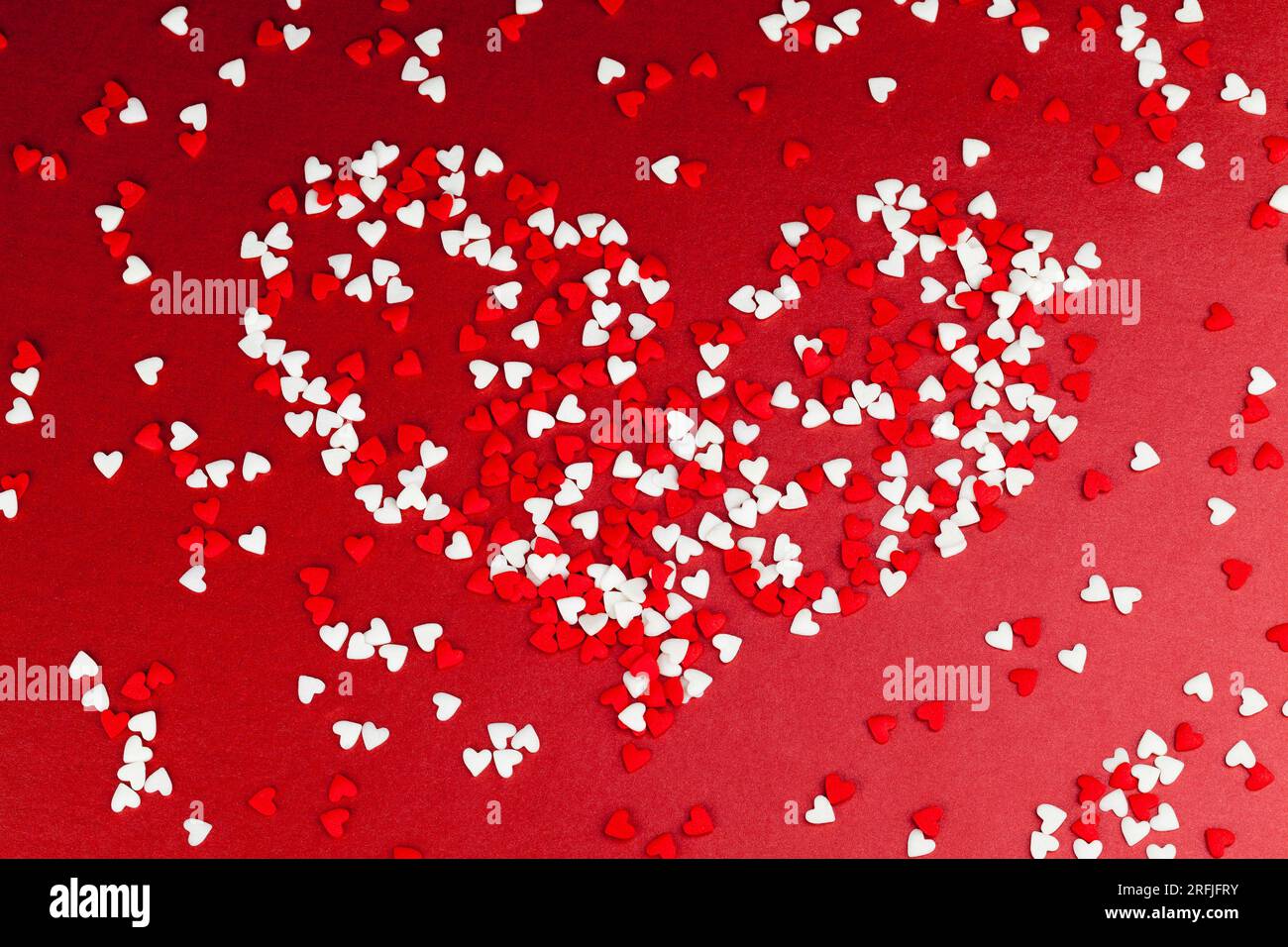 red and white sweet heart shaped candies for decorating desserts and ...