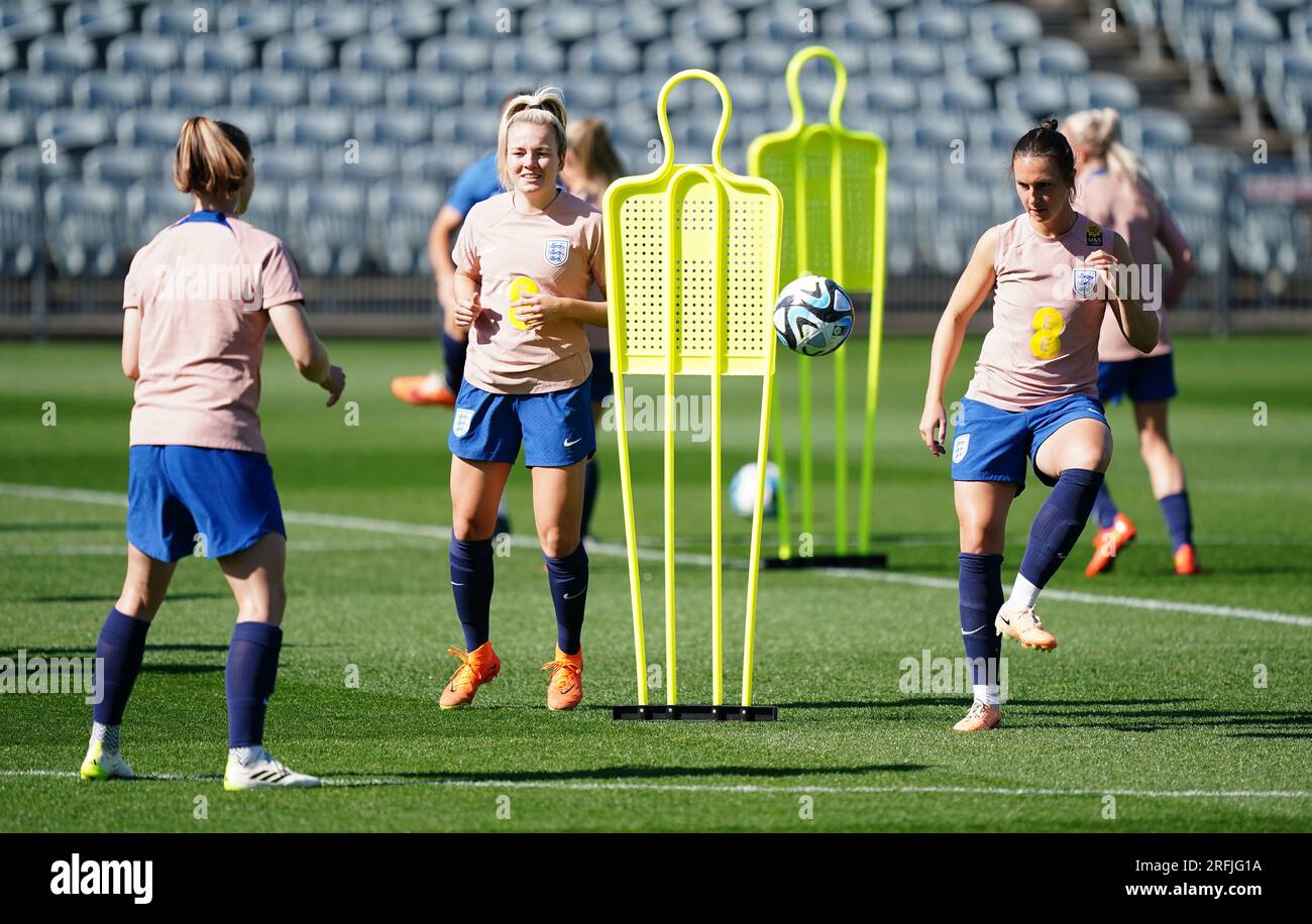 England's Lauren Hemp (left) and Lotte Wubben-Moy (right) in action ...