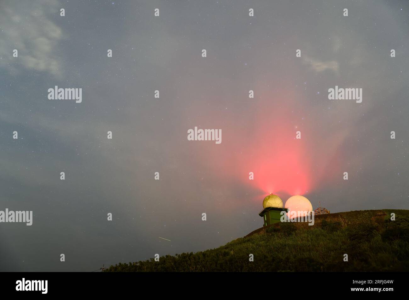 Gazing upon the Night Sky from the Summit. The radome glows ...