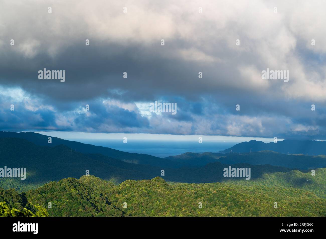 Nature's Canvas: Dynamic White Clouds Drifting Across the Mountain's ...