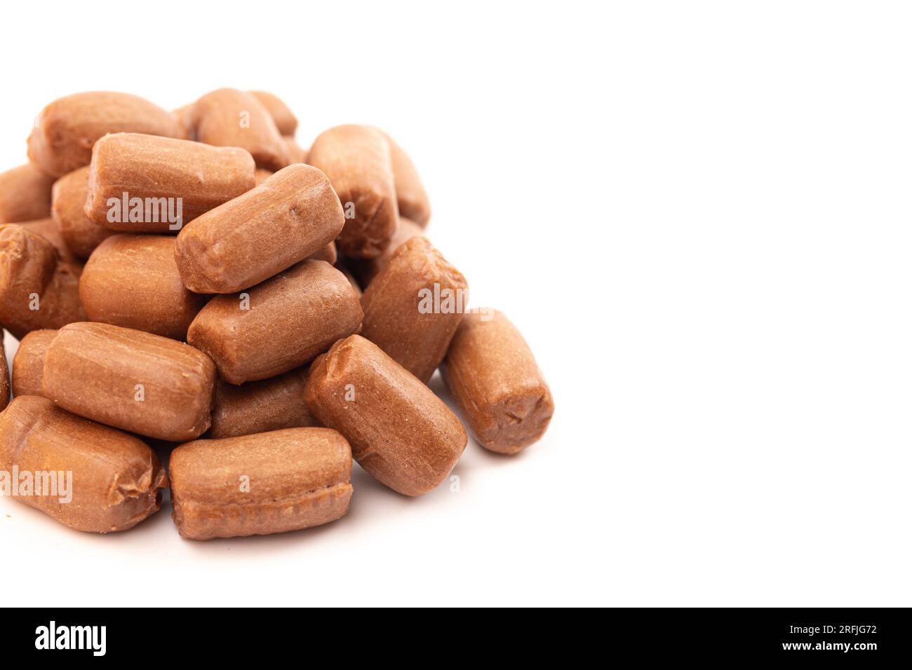 Freeze Dried Chocolate Candy Rolls on a White Background Stock Photo ...