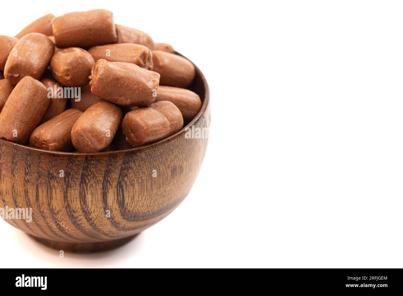 Freeze Dried Chocolate Candy Rolls on a White Background Stock Photo ...