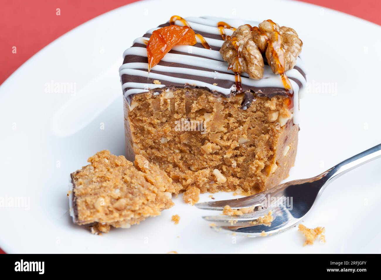 sweet cake in the shape of a cylinder, made of peanuts, sugar and dairy ...