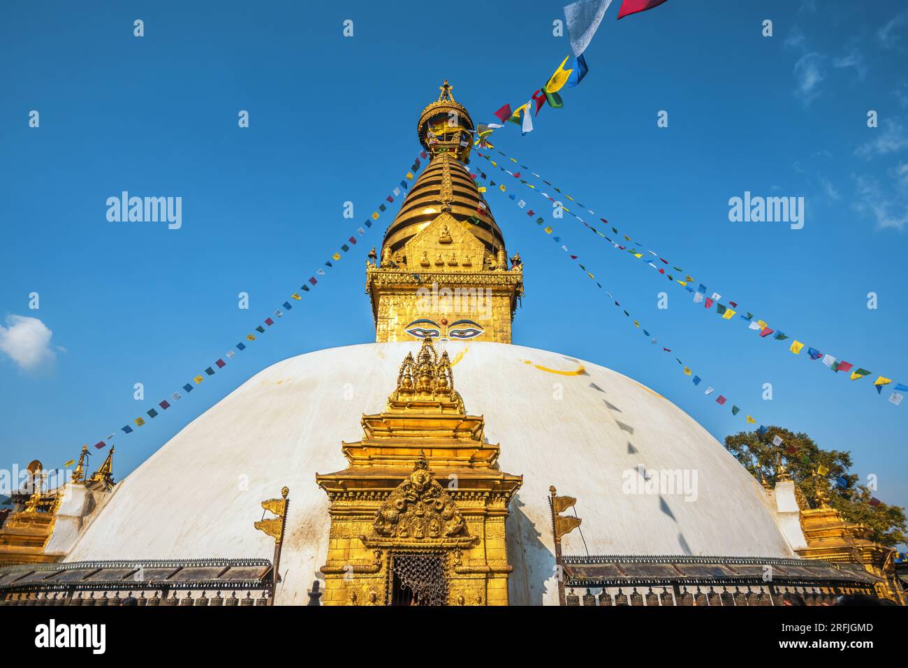 The dome and gold spire of Swayambhunath Stupa, also known as the ...