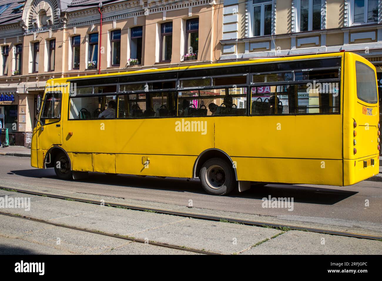 Kyiv, Ukraine - August 01, 2023 Local bus rolling in downtown Kyiv ...