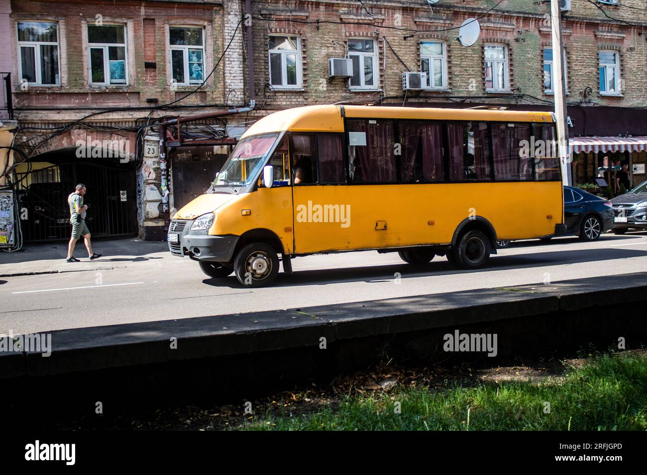 Kyiv, Ukraine - August 01, 2023 Local bus rolling in downtown Kyiv ...