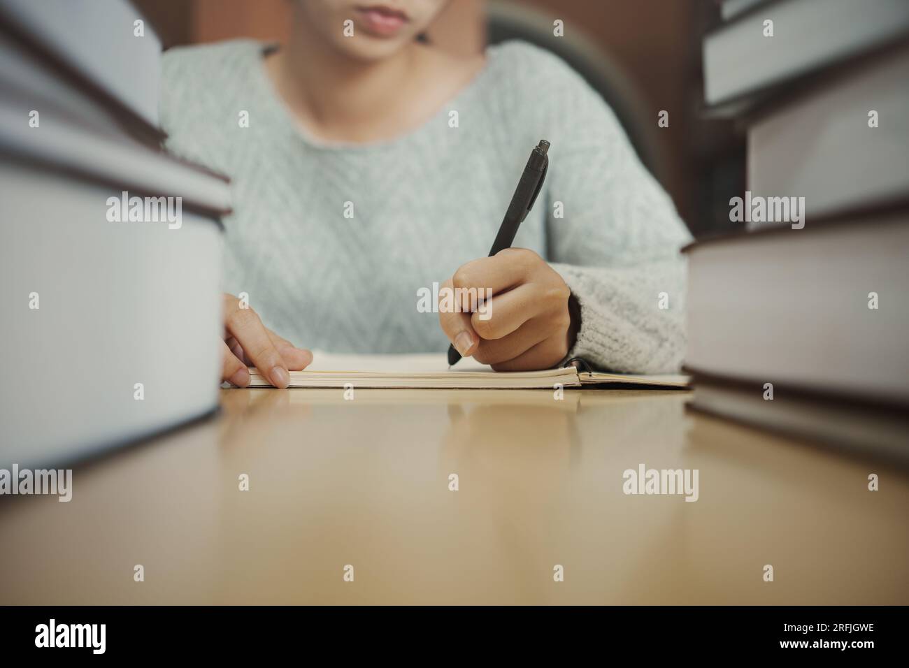 Student preparing for college test, exam, reading book, studying ...