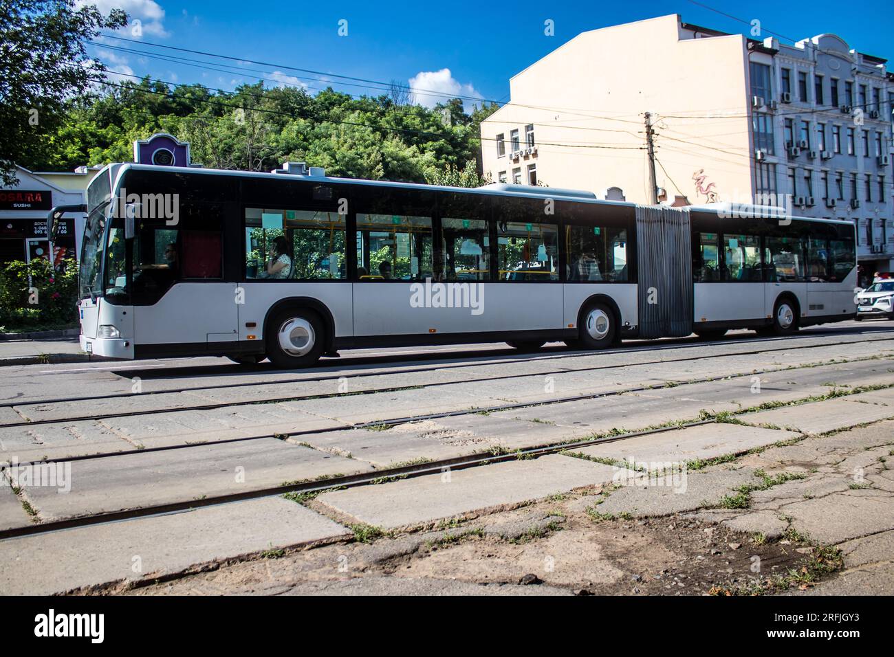 Kyiv, Ukraine - August 01, 2023 Local bus rolling in downtown Kyiv ...