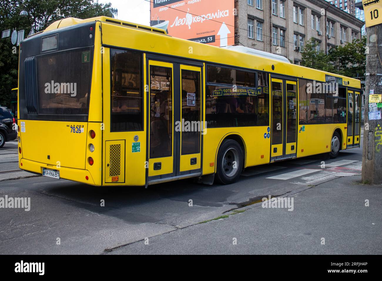 Kyiv, Ukraine - August 01, 2023 Local bus rolling in downtown Kyiv ...