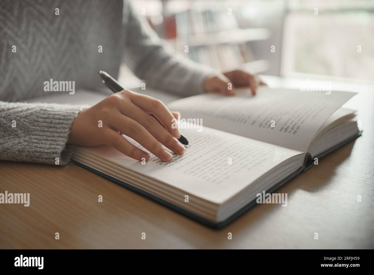Lesson female studying test books hi-res stock photography and images ...