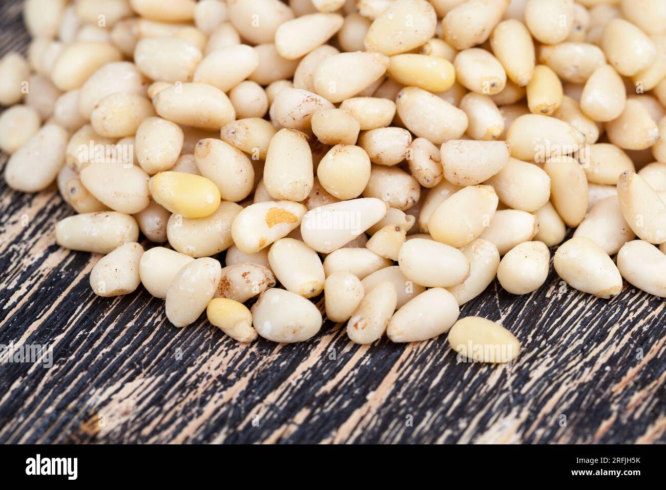 useful nuts, a part of the shell remains on the cedar nuts, peeled pine ...