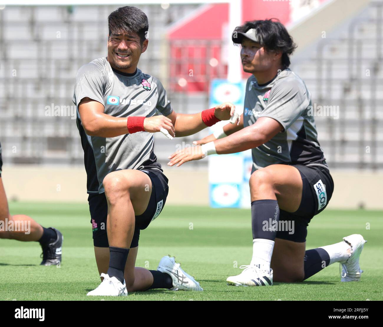 Rikiya Matsuda (L) of the Japan national rugby union team takes part in ...