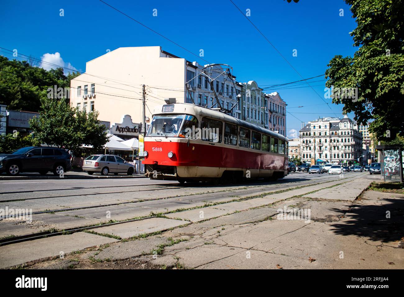 Kyiv, Ukraine - August 01, 2023 Tram rolling in downtown Kyiv. People ...