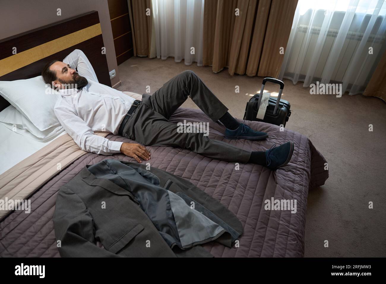 Suit shoes on bed hi-res stock photography and images - Alamy